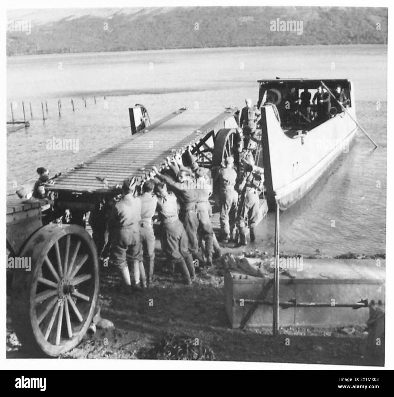 PHOTOGRAPHS OF EQUIPMENT - 60 ft. Wheeled Pier - loading on to MLC from ...