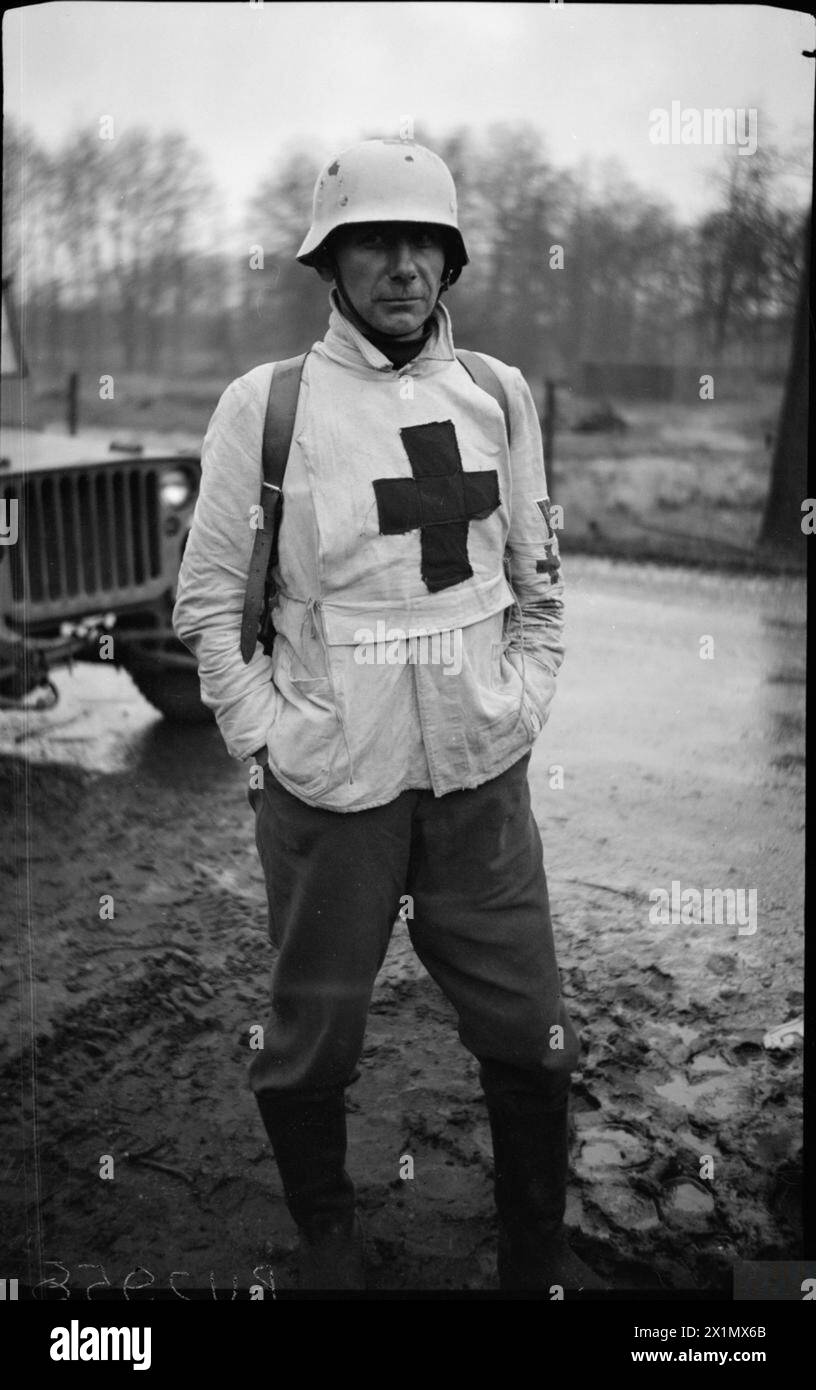 A German medical orderly is captured by British forces at Ochtrup near ...