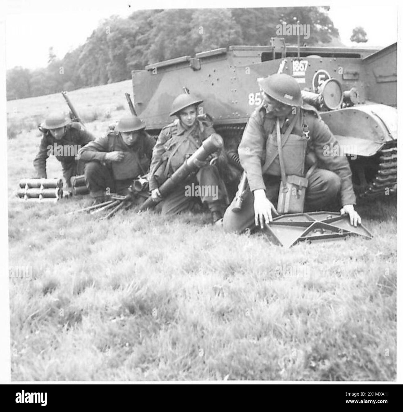 ACTION! - A 3 inch mortar section taking cover behind their Bren ...
