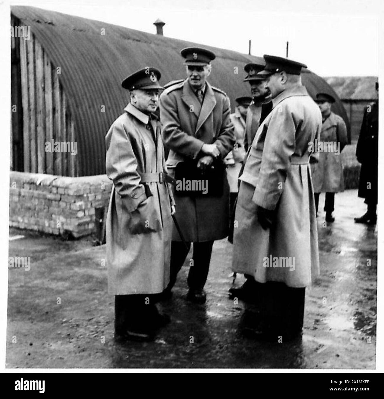 Members of Parliament observing Anti-Aircraft defenses alongside senior ...