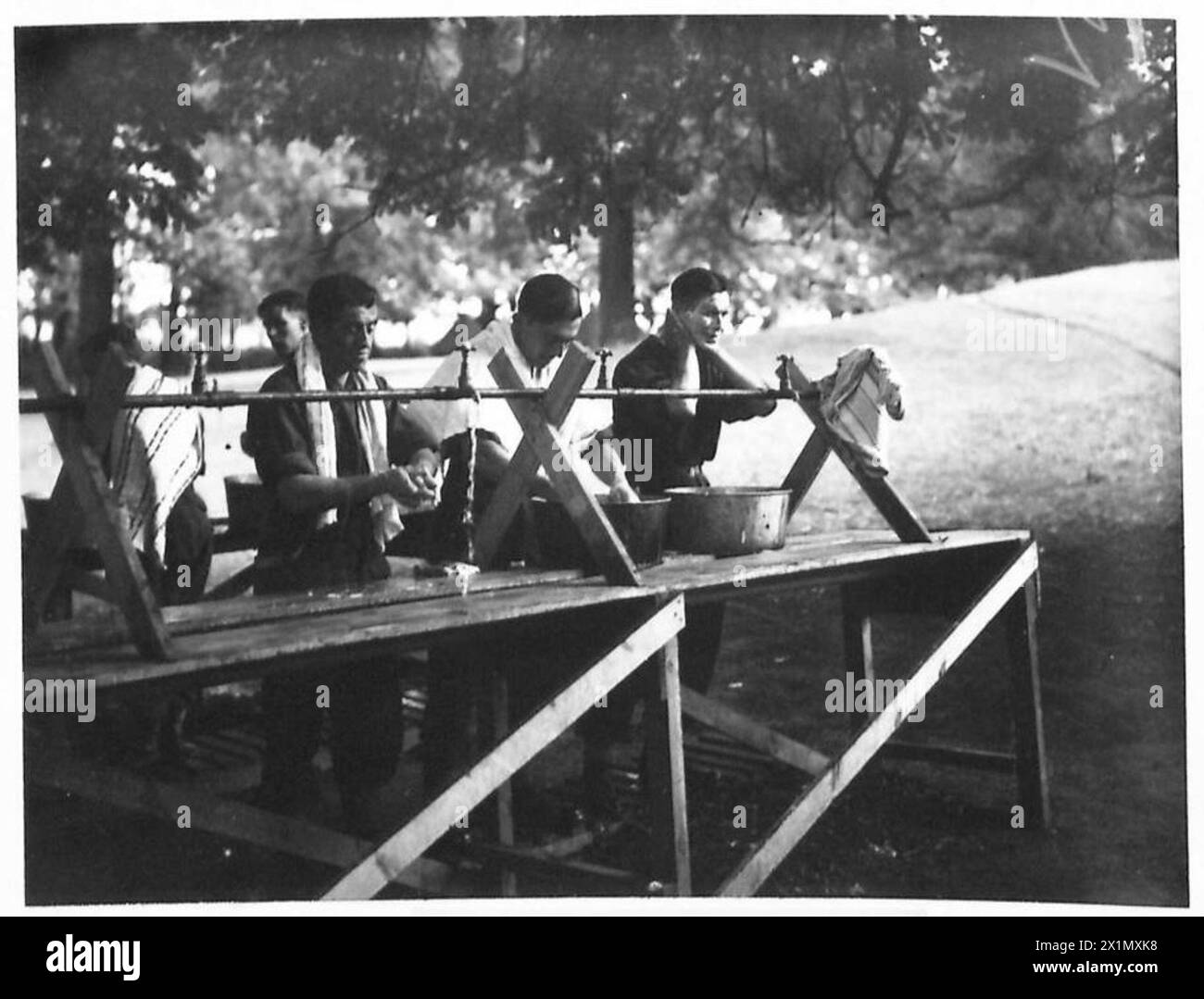 UNDER CANVAS IN A MODERN CAMP - Troops performing their morning ...