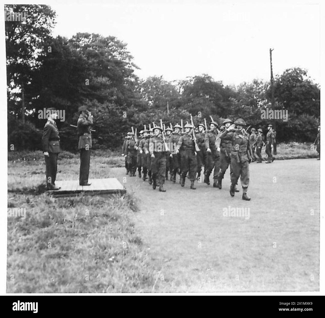 MILITARY POLICE RECEIVE BATTLE TRAINING - A scene during the march past ...