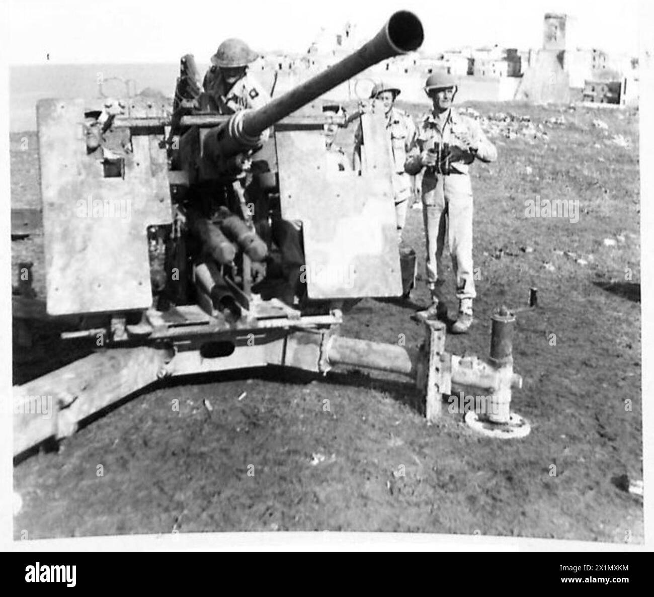 British Army guns defend newly captured positions in Termoli, Italy ...