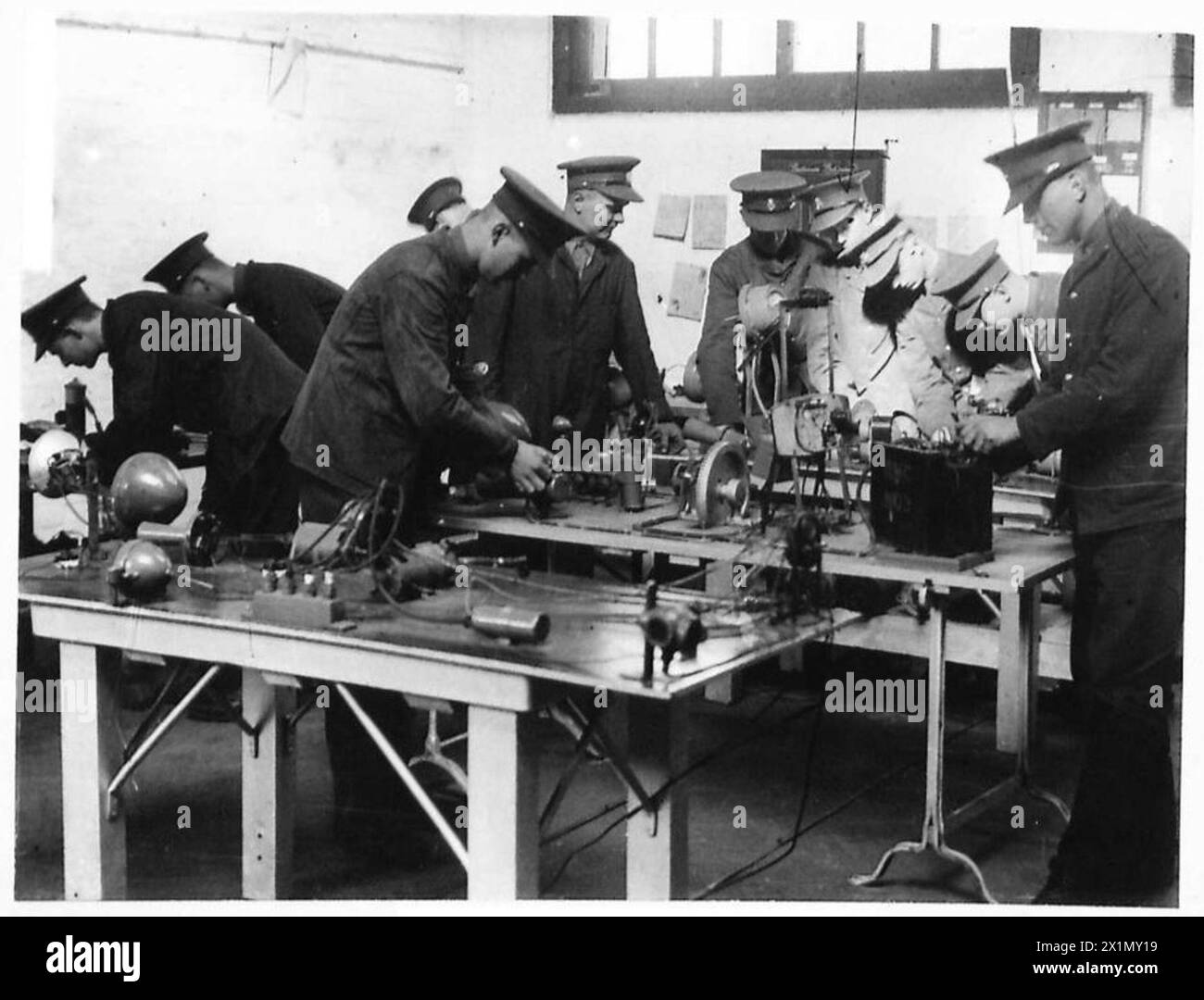 Cadets conduct training exercises in a workshop at Camberley under ...