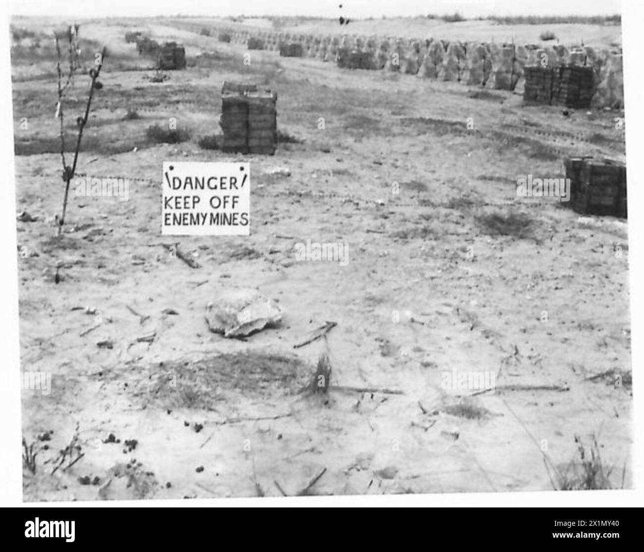 EIGHTH ARMY : AN AIRFIELD UNDER PREPARATION - Stacks of mines removed ...
