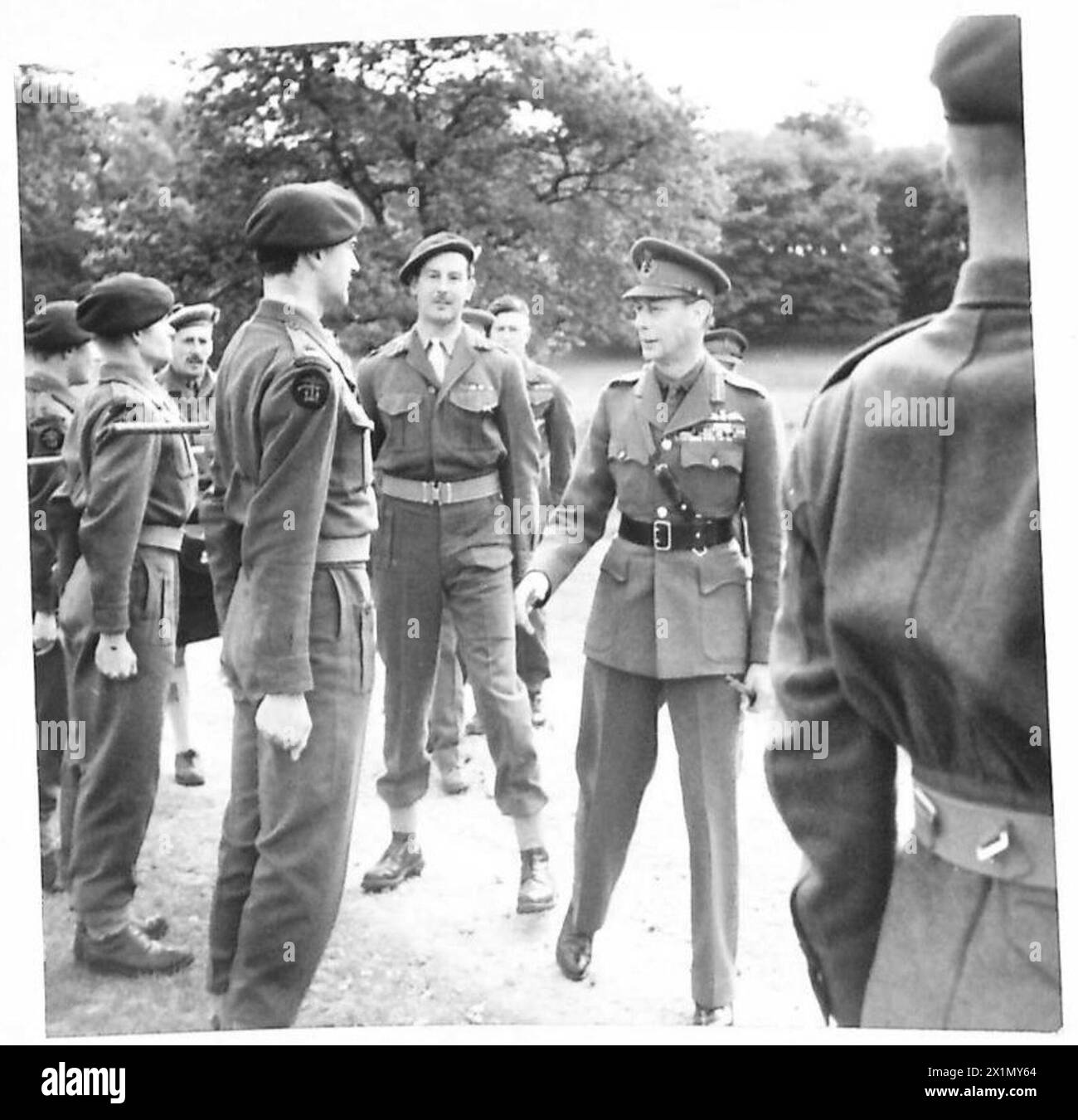 THE KING'S VISIT TO INVASION TROOPS - The King inspecting Brigade H.Q ...