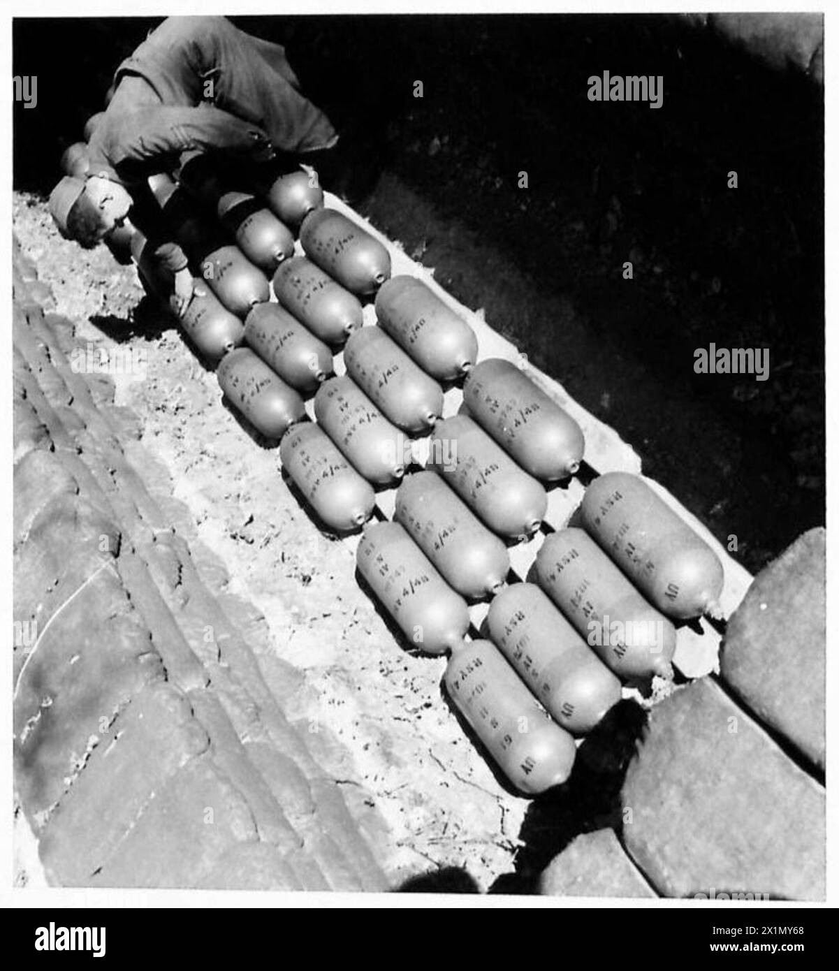 A Livens filled 'G' end is shown under British Army handling ...
