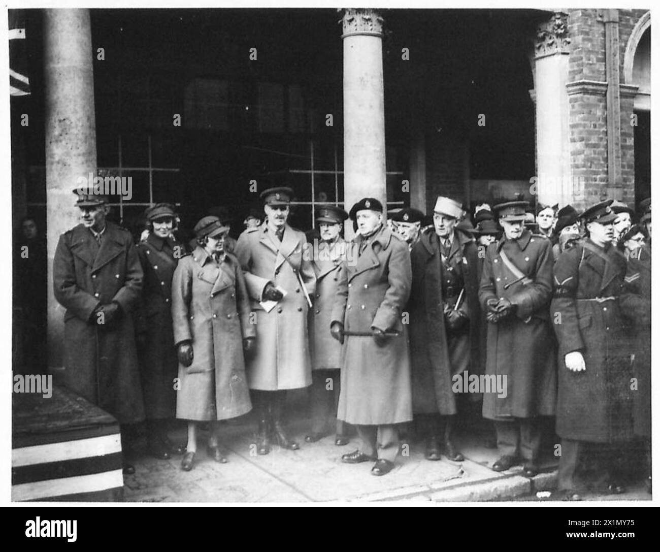 Military and civic figures gather at the saluting base during Farnham ...
