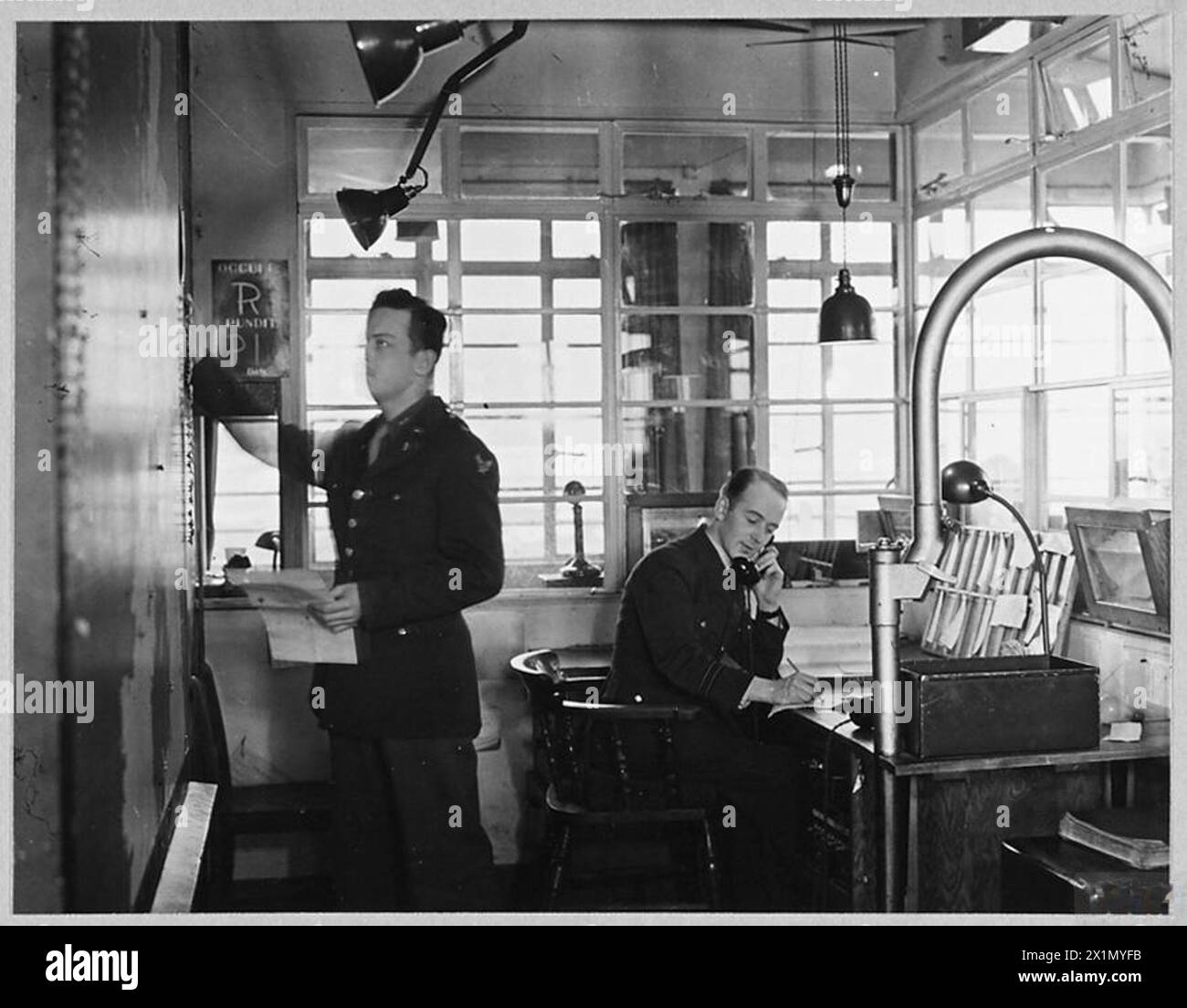Flight Lieutenant L. Leithhead of Glasgow coordinates Atlantic air ...