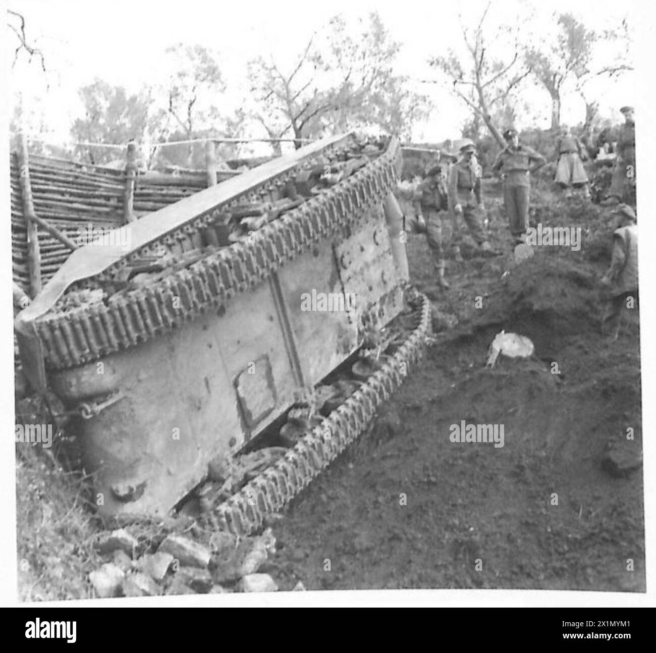 ITALY : FIFTH ARMYRECOVERY OF A SHERMAN TANK - After turning over twice ...