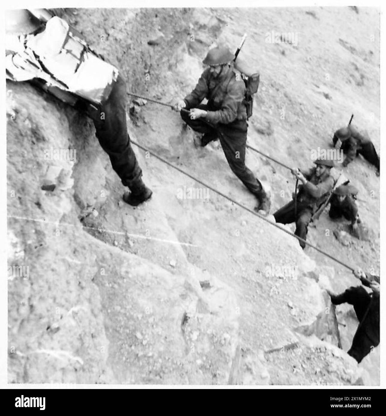 BATTLE SCHOOL TRAINING - Cliff climbing in full kit is a precarious ...