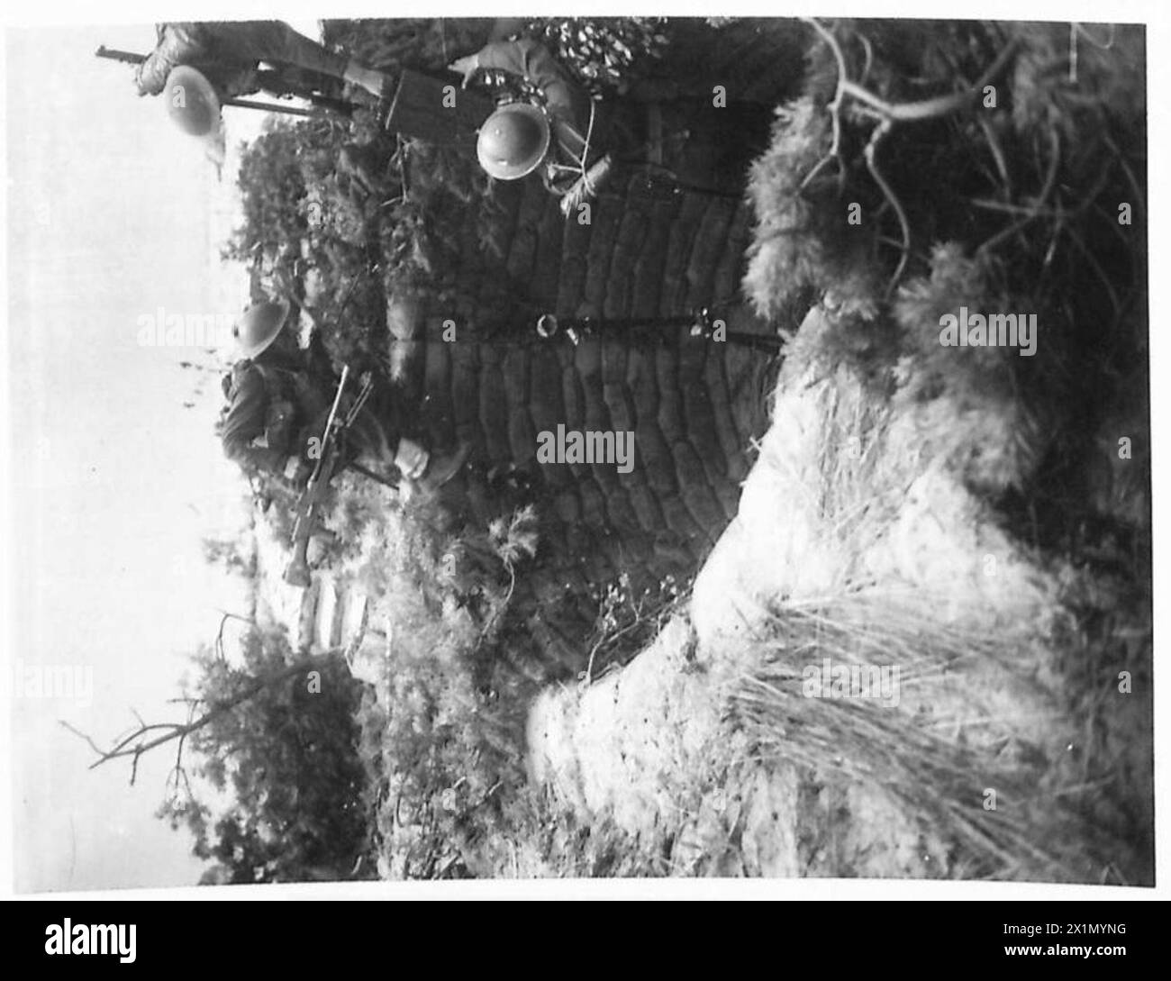 GREEN HOWARDS ON GUARD! - A Bren gunner jumping into a well-concealed ...