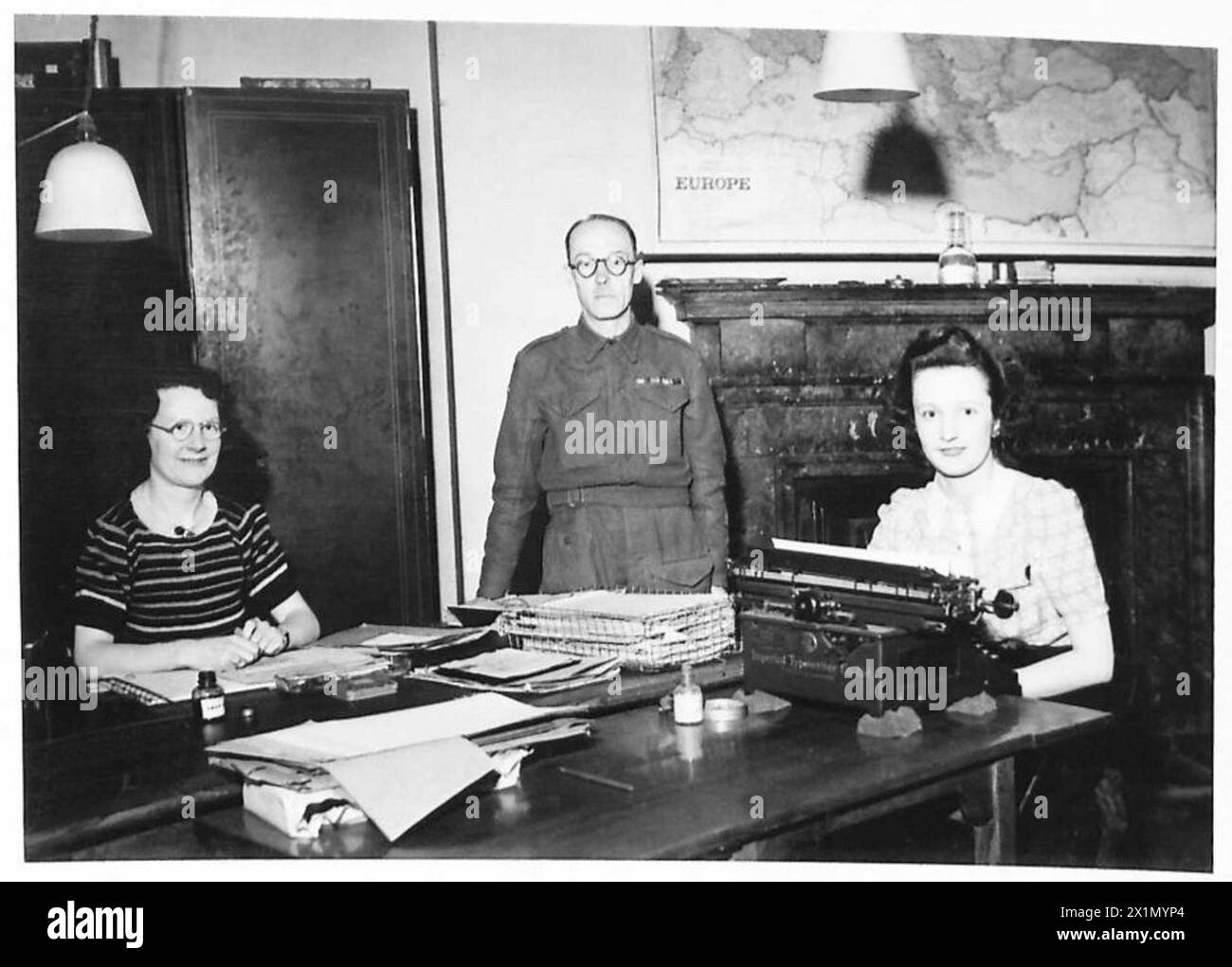 Staff members of the Army Council Secretariat perform administrative ...