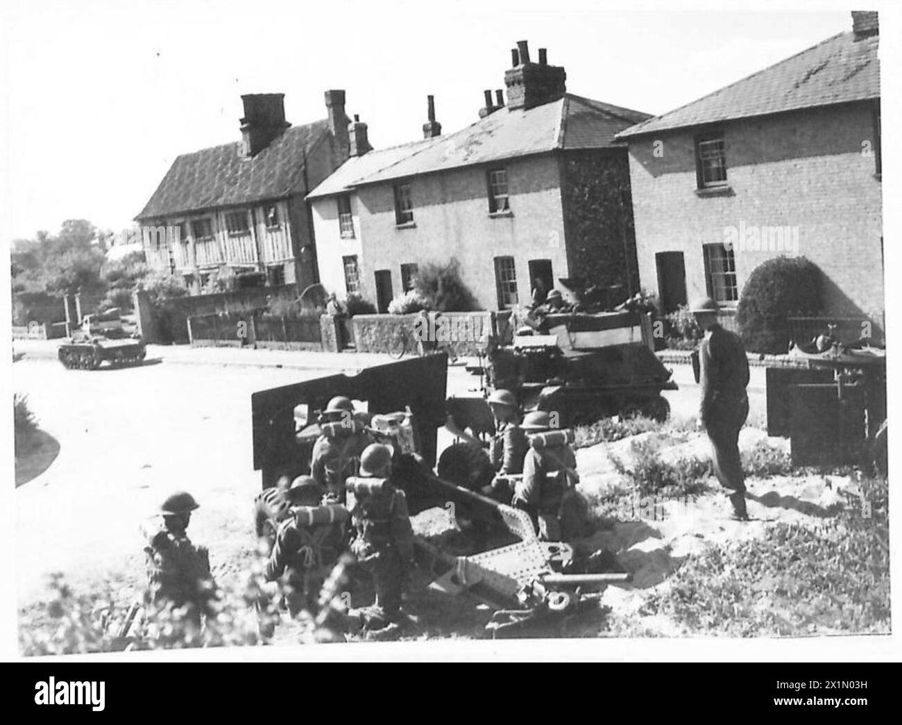 ACTIVITY IN EAST ANGLIA - A field gun positioned on the corner of a ...
