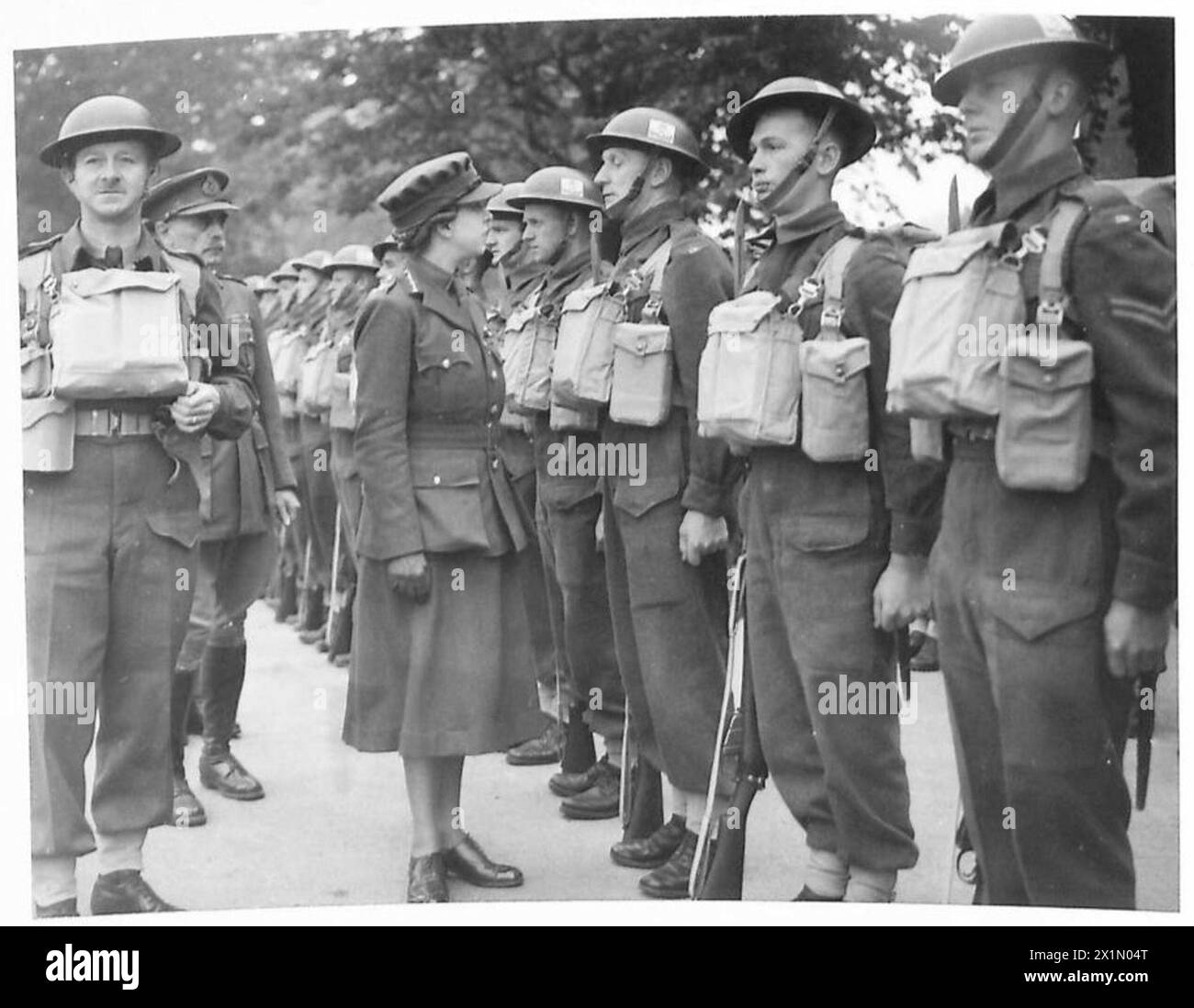 The Princess Royal inspects a British Columbia Regiment, speaking to ...