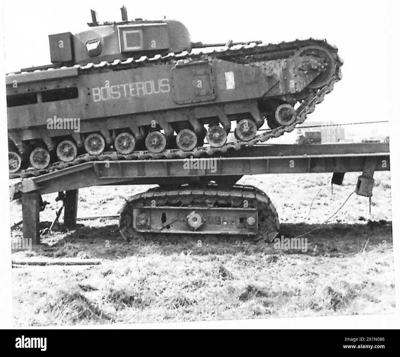 TANKS AND TRACKED TRANSPORTERS - Churchill tank being loaded on to a ...