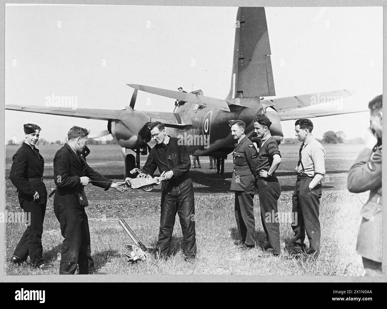 RAF armourers preparing a Boston III bomber for a daytime attack ...