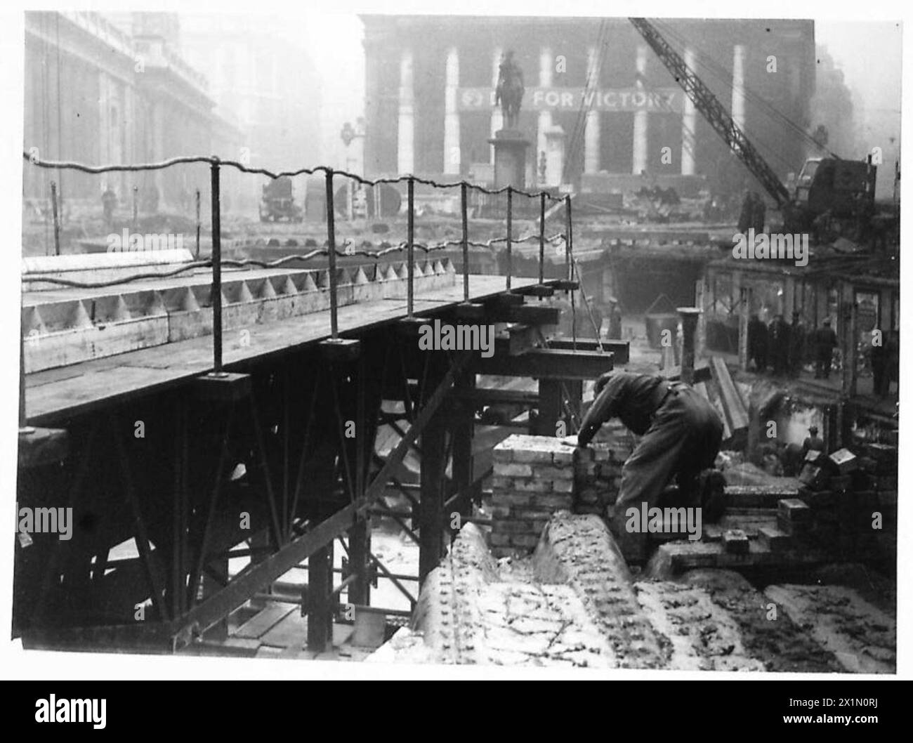 R.E.s CLEAR UP BOMB DAMAGE - This set of pictures show men of the Royal ...
