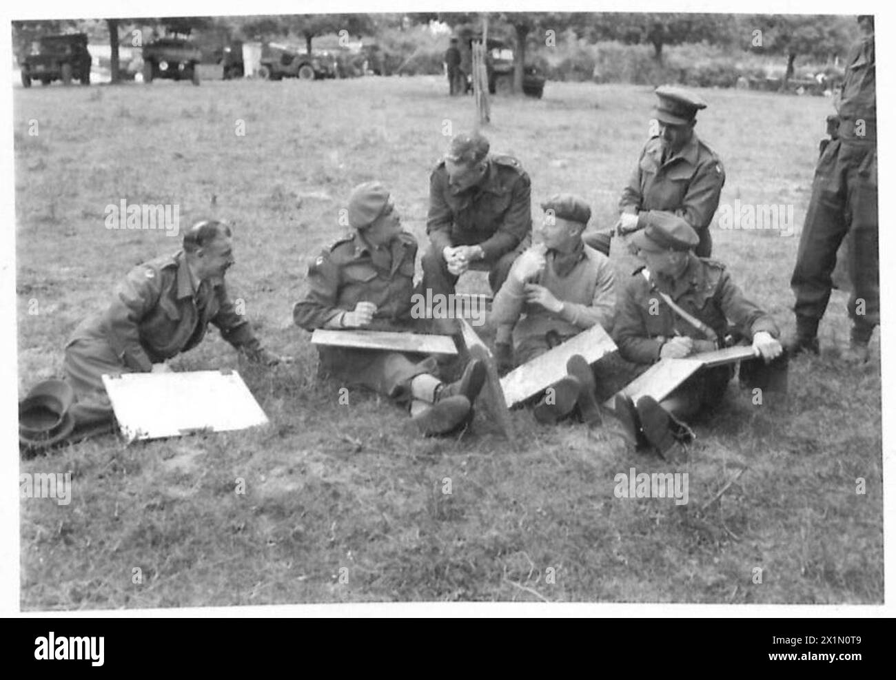 A Corps Commanders' conference includes Major General E.H. Barker of ...