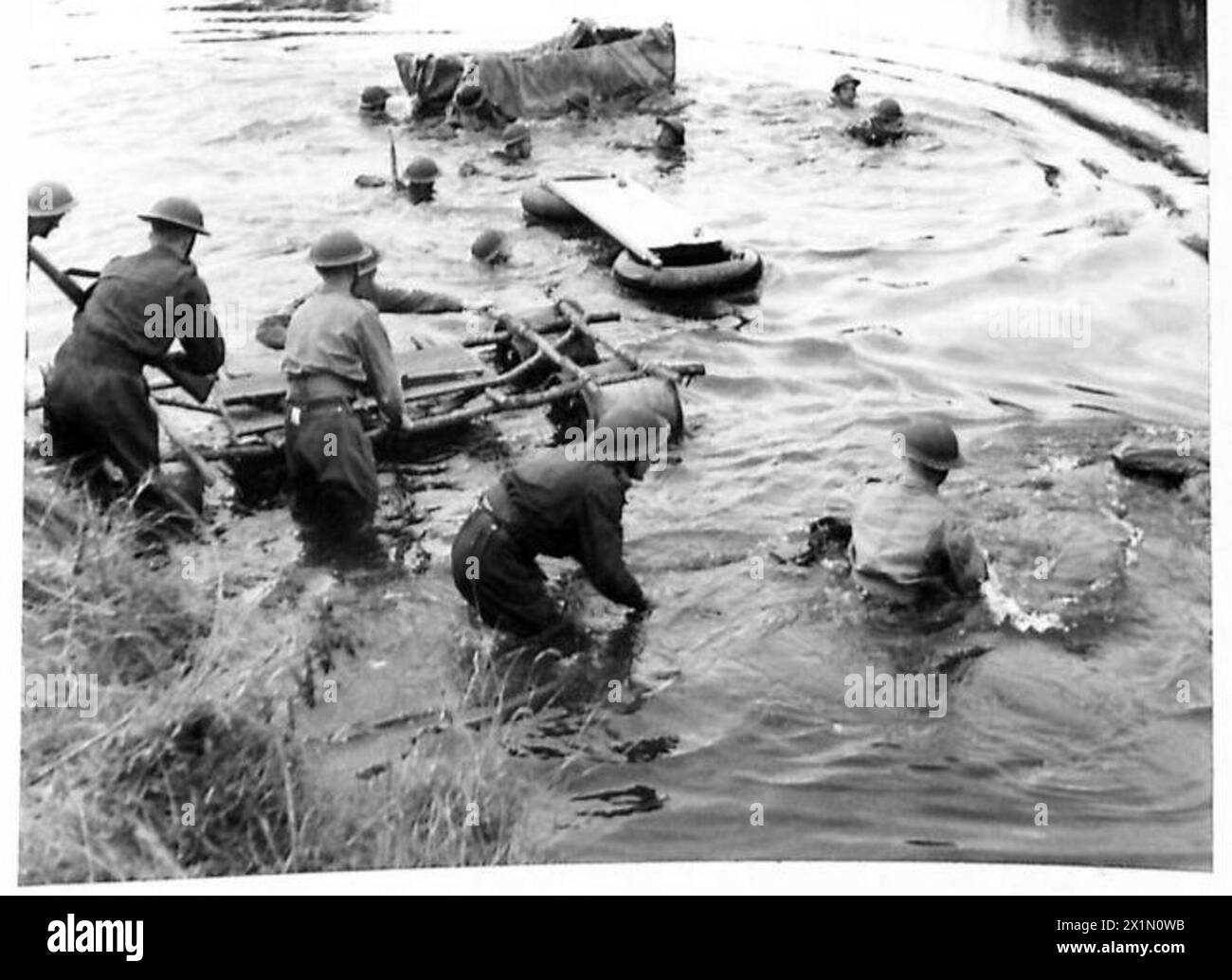 RA SEARCHLIGHT CREWS TRAIN FOR RIVER CROSSING - Stretchers and kit ...