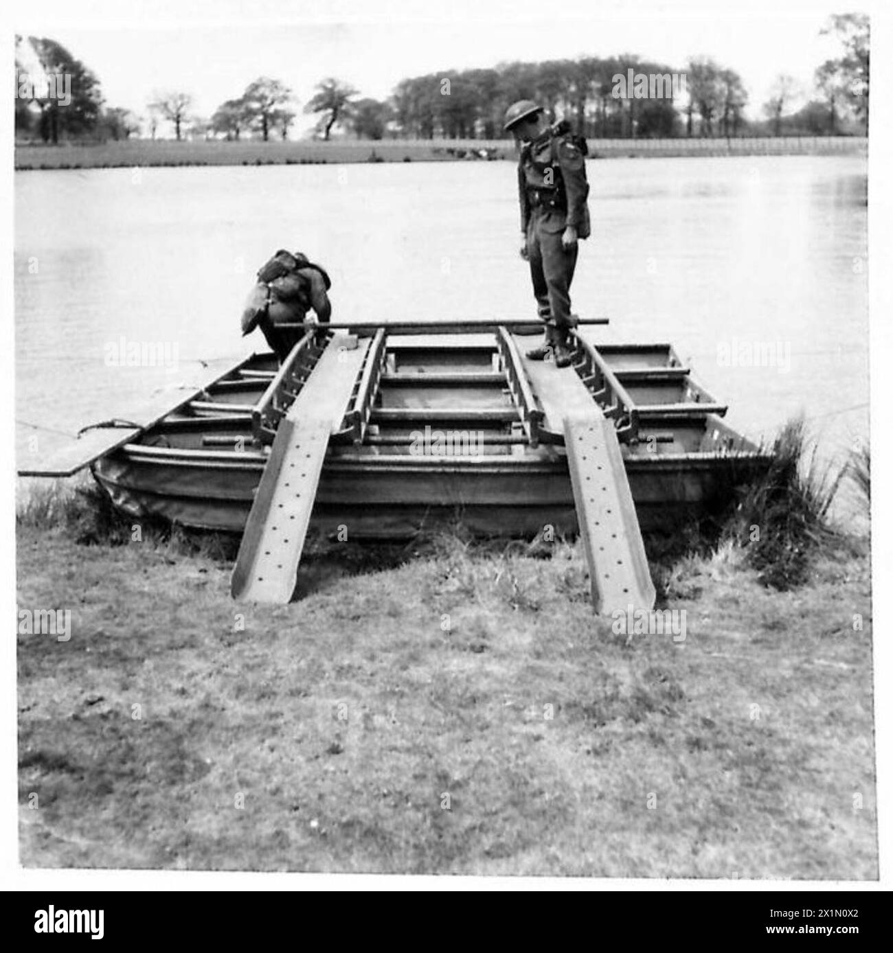 FERRYING OF GUNS AND TRUCKS BY MEANS OF ASSAULT BOATS - Track bridges ...