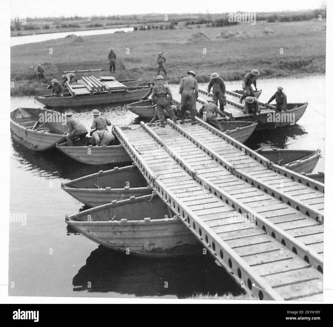 A BRIDGE IN TWENTY MINUTES - The middle raft goes into position ...