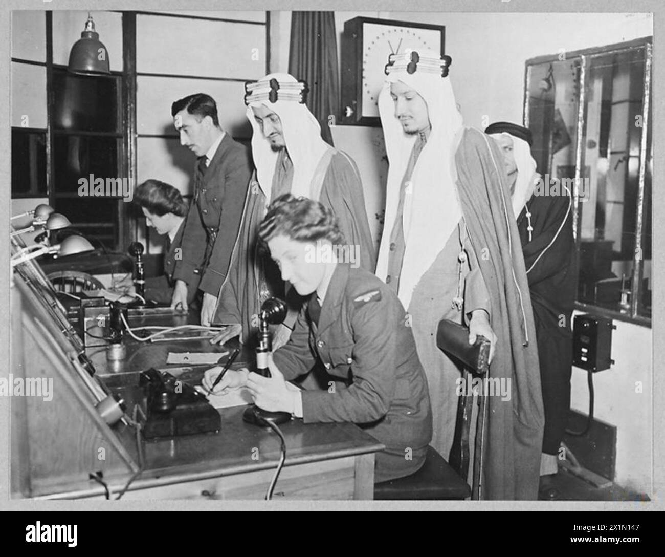 ARABIAN PRINCES SEE RAF CREWS RETURN FROM BERLIN - Emir Feisal and his ...