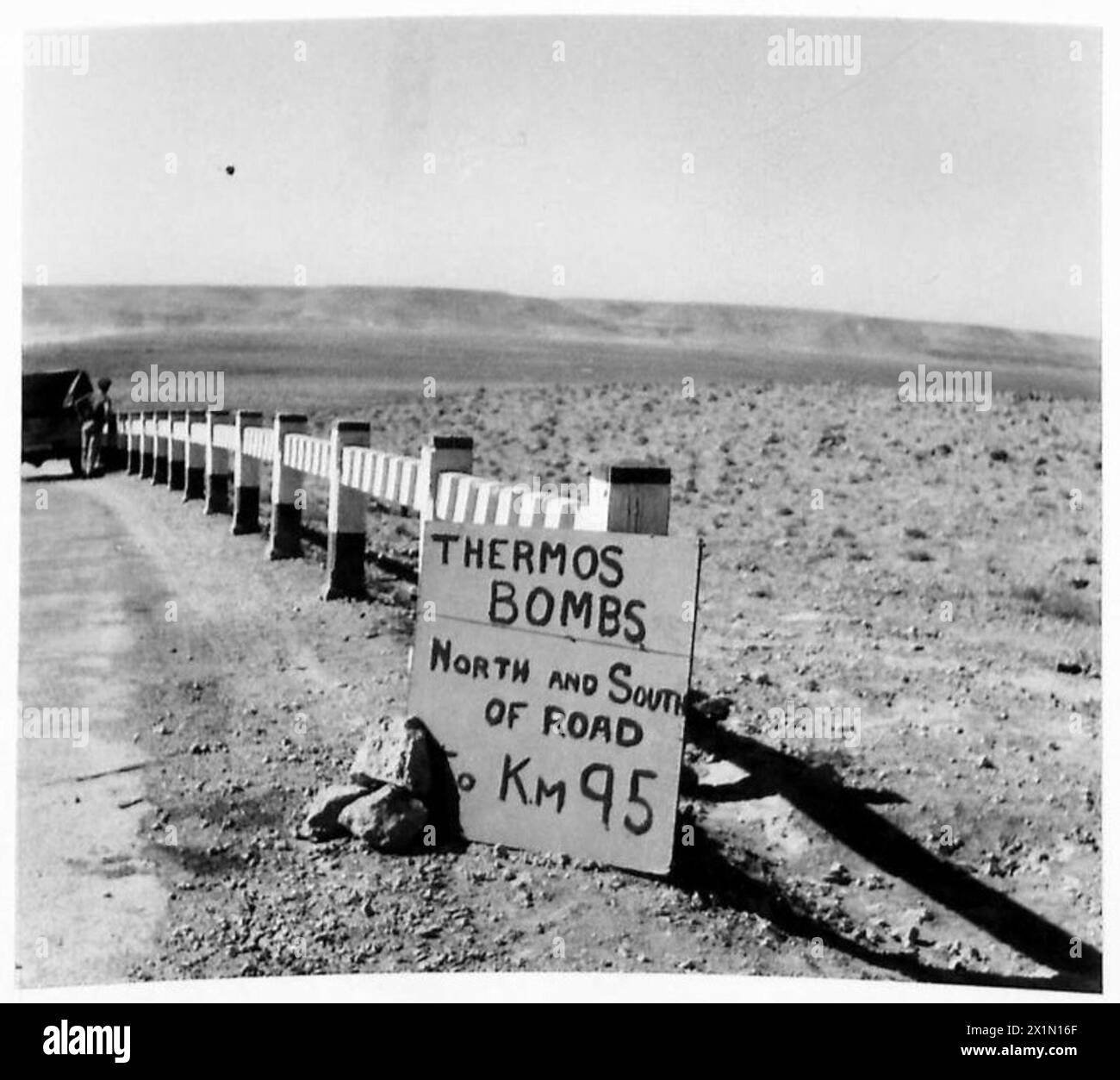 PICTURES TAKEN OUTSIDE DERNA - A notice board warning troops of booby ...