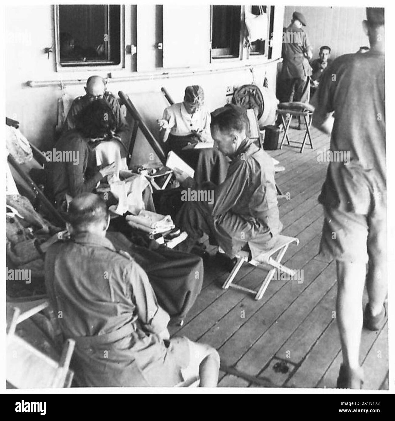 Former prisoners of war and civilian internees travel home aboard the S ...