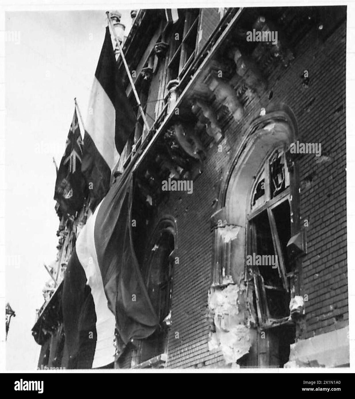 CALAIS RETURNS TO LIFE. - Part of the damaged Town Hall, caused by ...