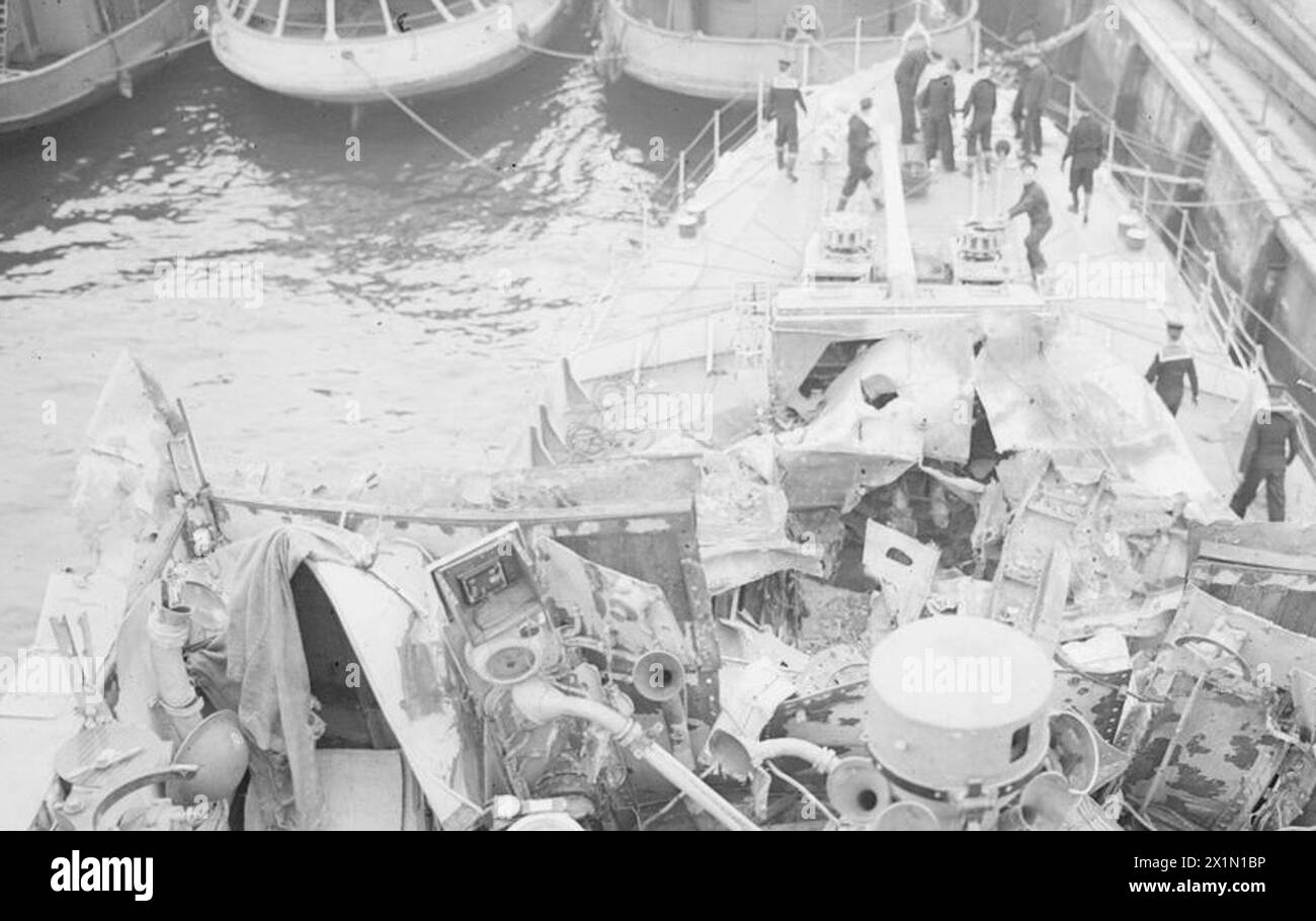 HMS Escapade shows damage to the bridge and other areas in a general ...