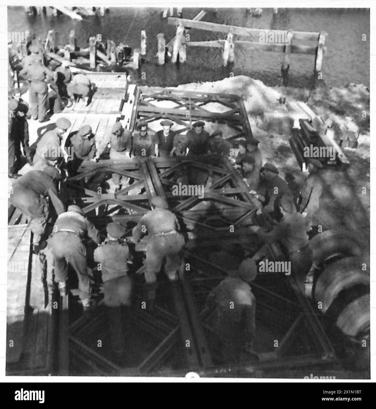 BRIDGING: 49 DIV. 1ST. CORPS B.L.A. - REs off-loading steel-panels for ...