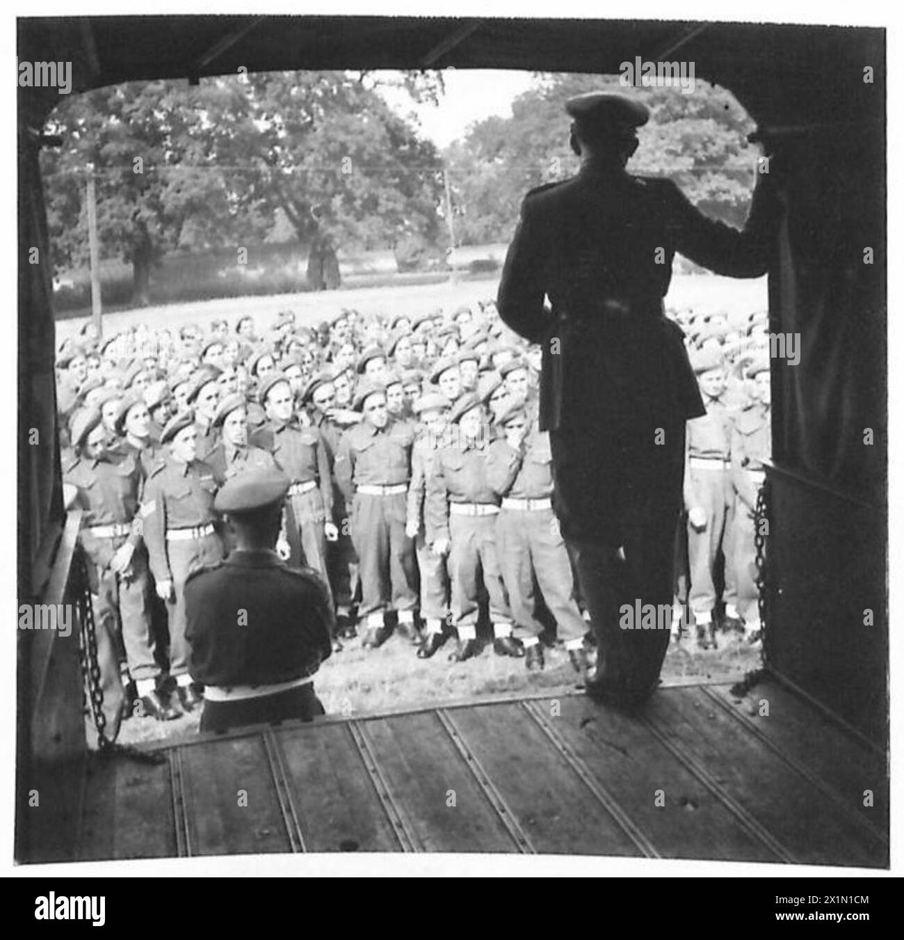 Major General Pratt addresses Newfoundland troops from the back of a ...