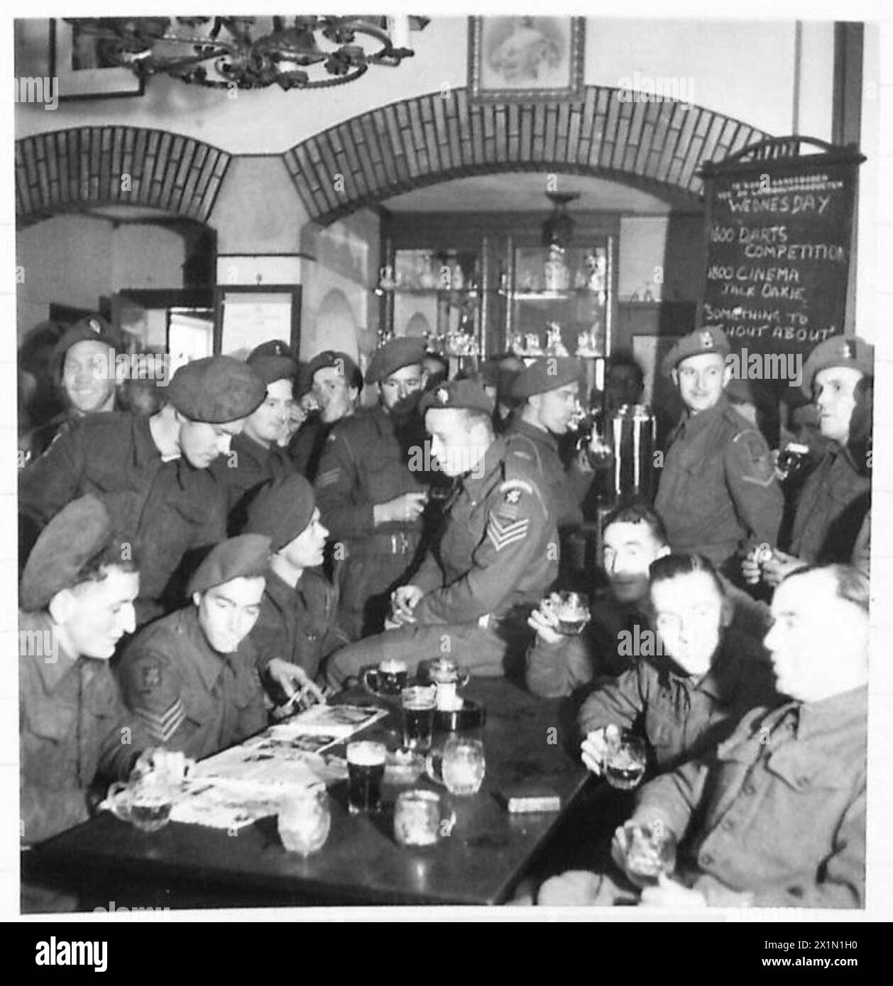British Army personnel of the 21st Army Group socializing at a country ...