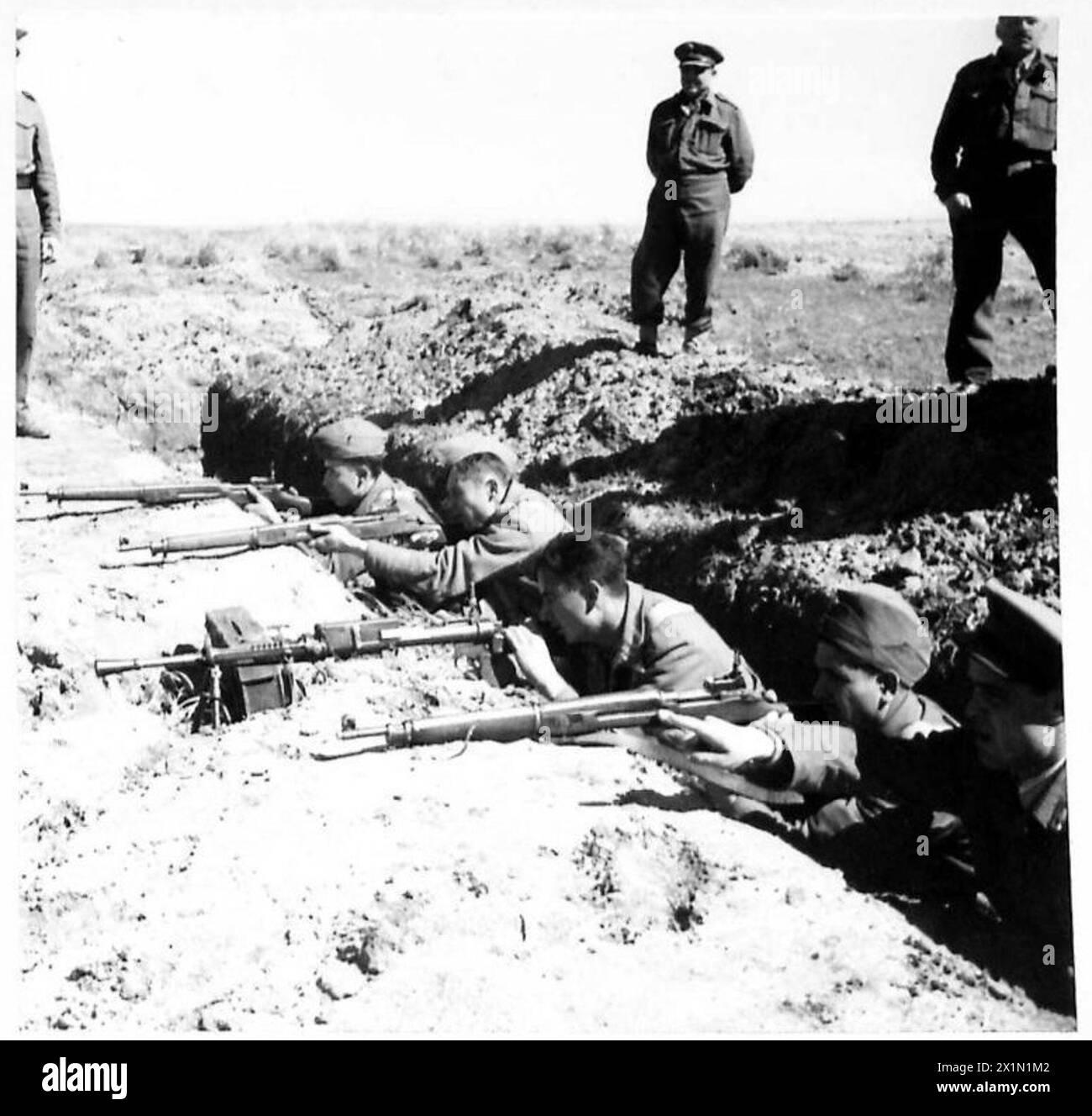 A GREEK ARMY IN TRAINING - Greek soldiers defending a trench , British ...