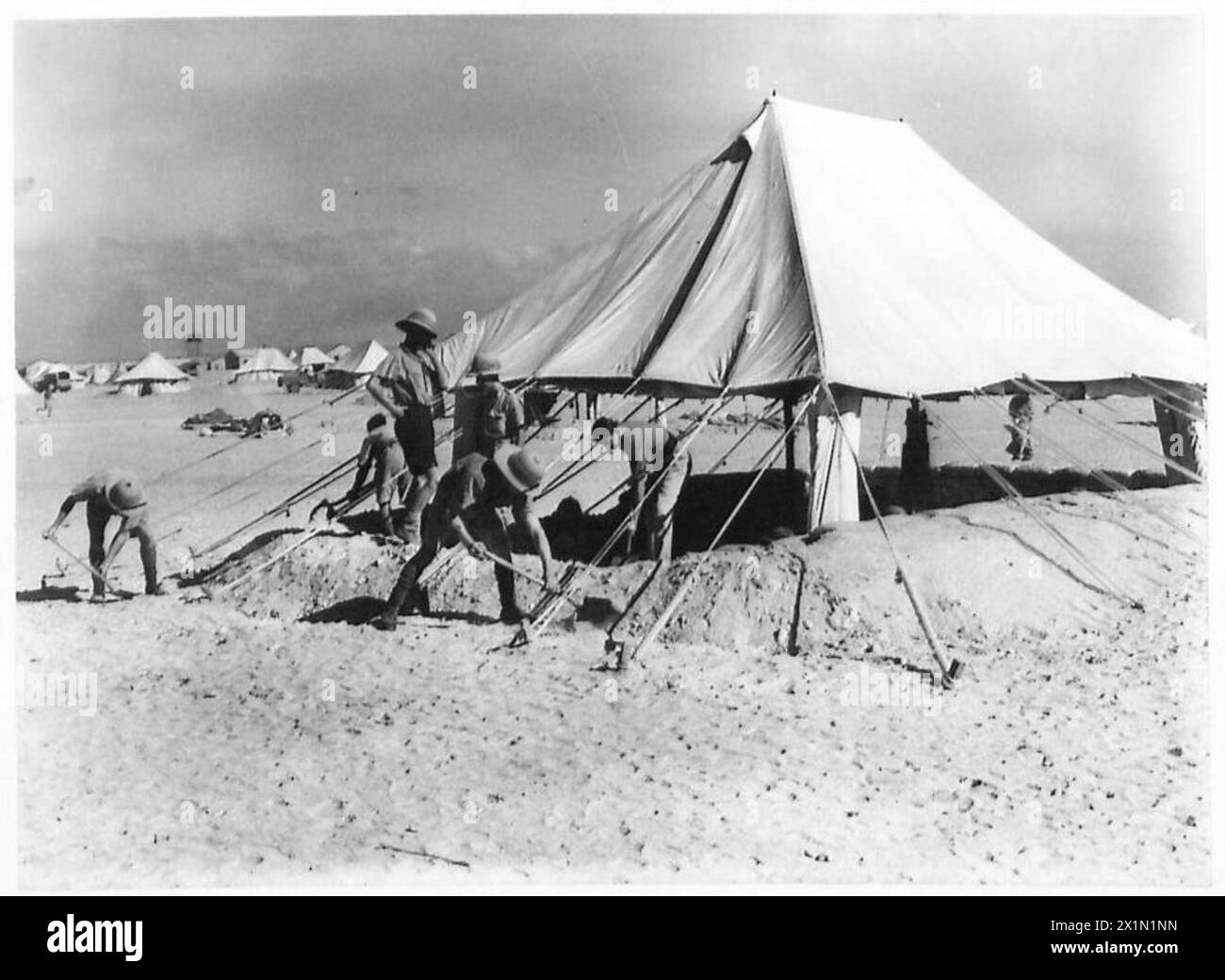 Infantrymen in Egypt maintain their tents, illustrating routine field ...
