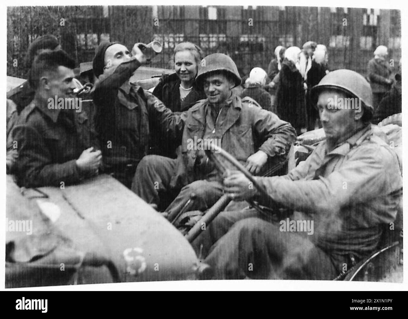 P.O.W. LIFE IN GERMANY - A long and welcome drink for a British POW ...