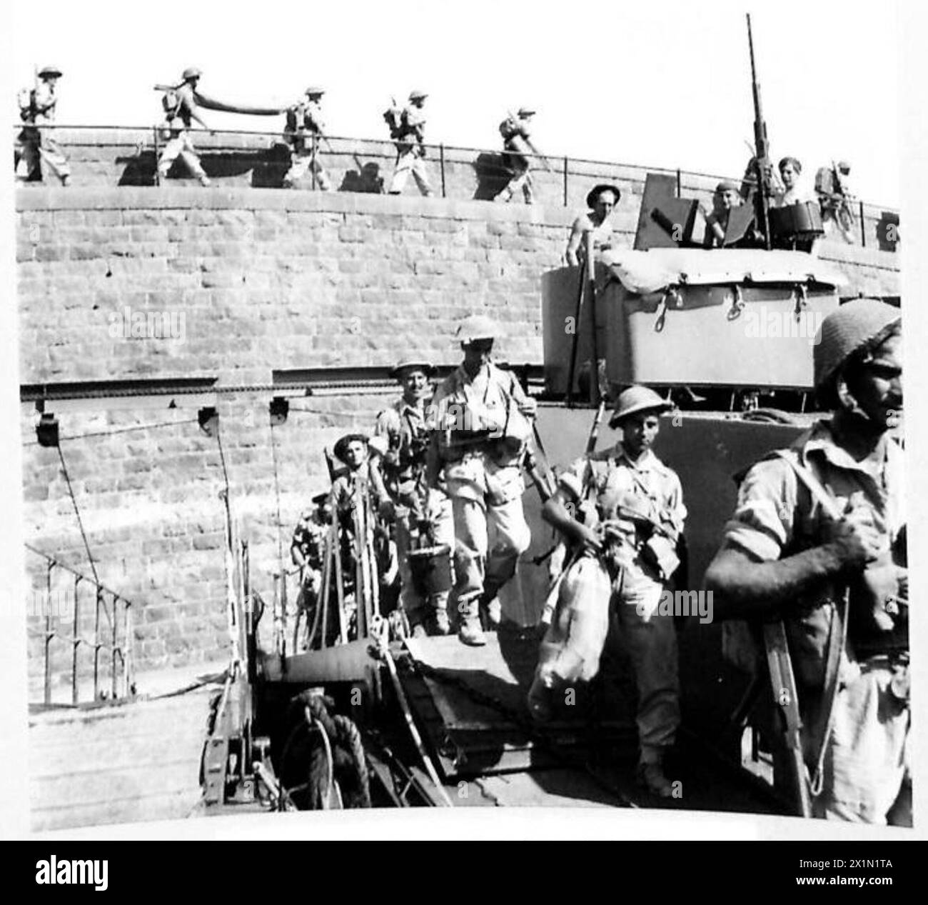 'B' Company of a British infantry battalion boards a Landing Craft ...