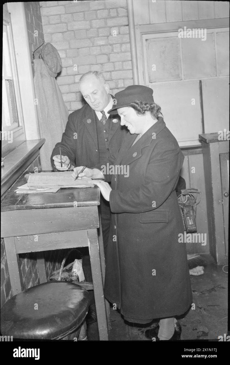 Signalwoman Daisy Cook signs on for duty at Molland signal box in Devon ...