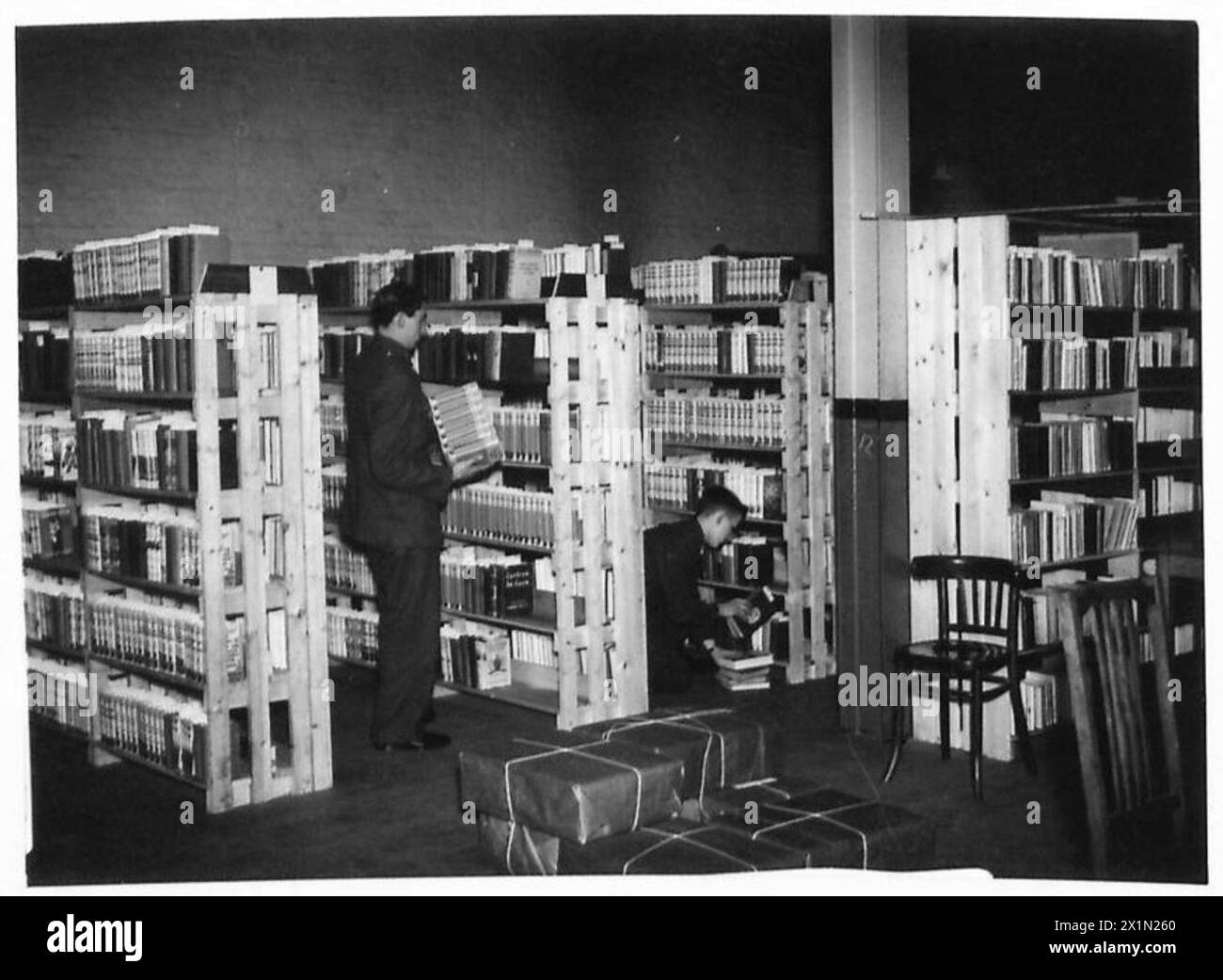 BOOKS AND MAGAZINES FOR THE TROOPS OVERSEAS - Books being placed on the ...