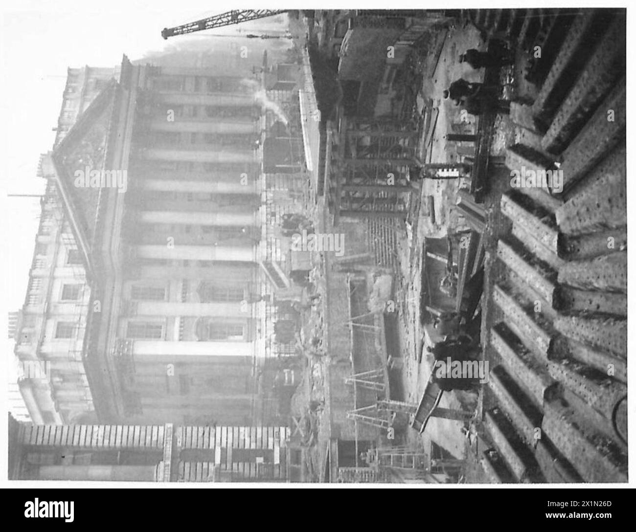 R.E.s CLEAR UP BOMB DAMAGE - This set of pictures show men of the Royal ...