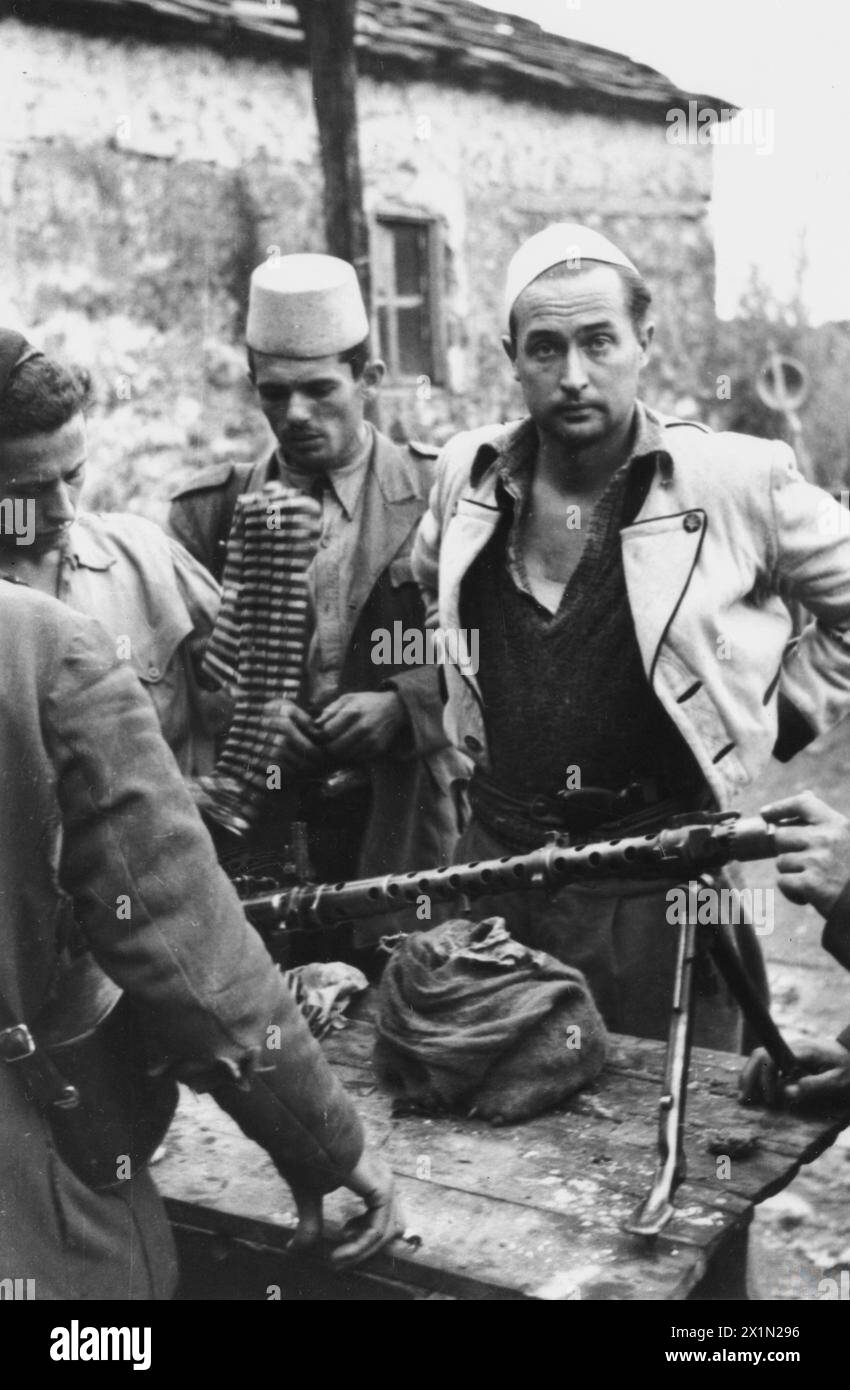 Zoggists, including Gaitcho Goga, are undergoing weapons training with a light machine gun in ...