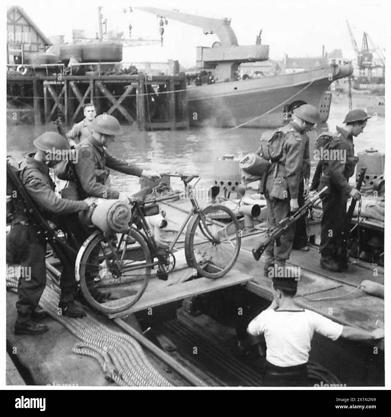 TRAINING FOR COMBINED OPERATIONS - Equipment being loaded for the ...
