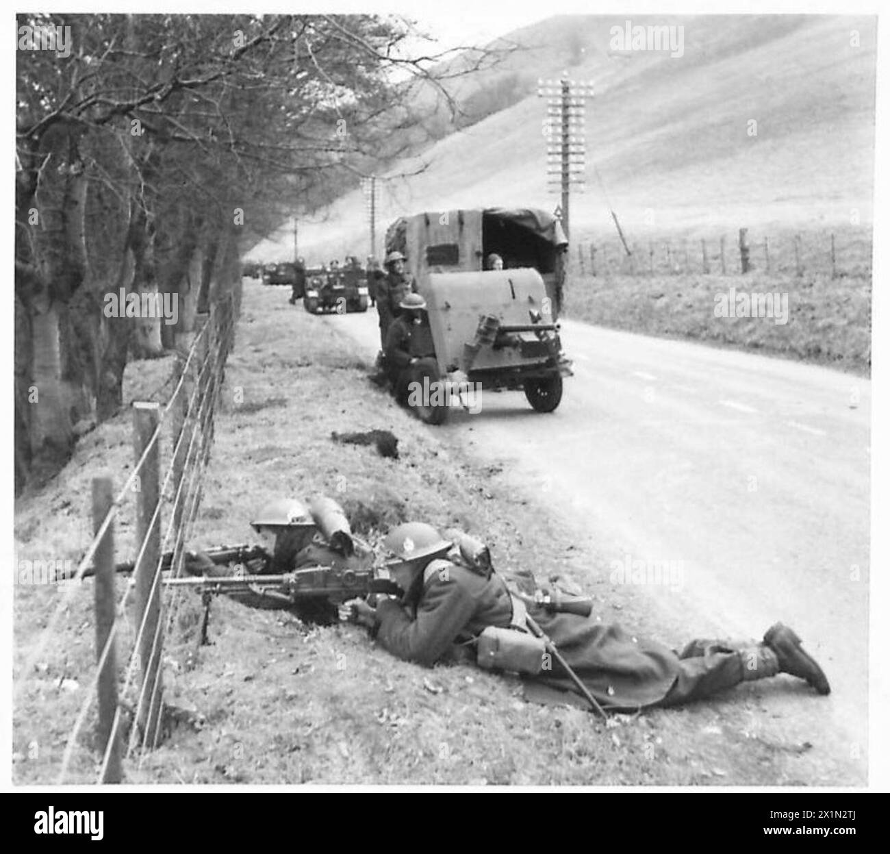 A DIVISIONAL EXERCISE IN SCOTLAND - A defenders anti-tank gun in action ...