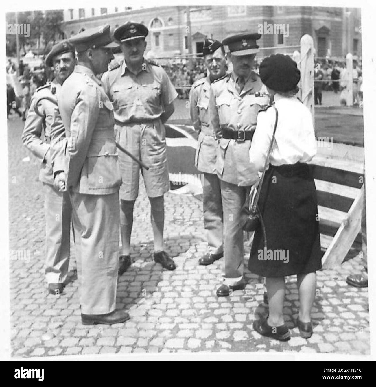 Major General Penny speaks with officers during a church parade in Rome ...
