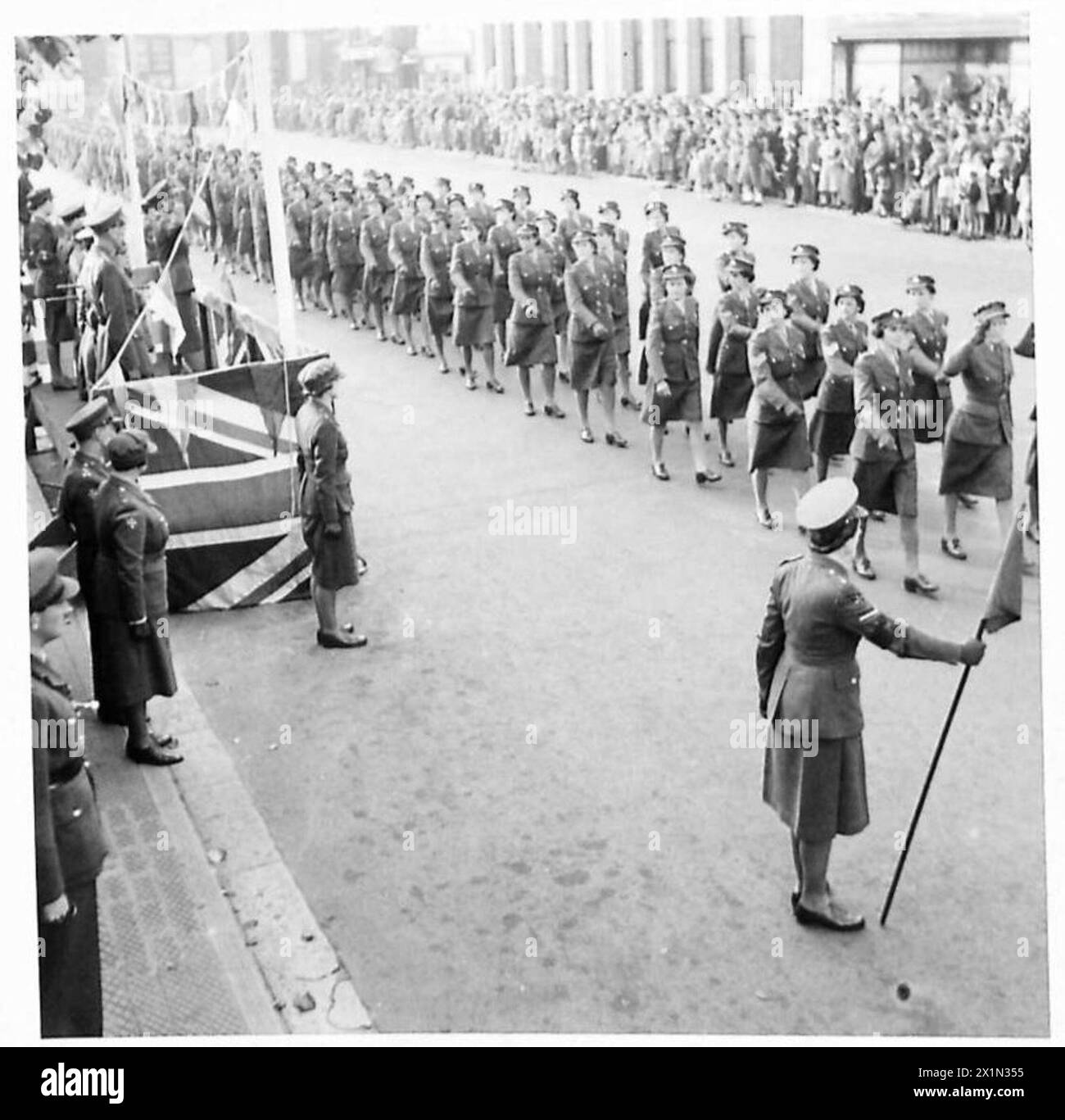 Members of the ATS march past a saluting base during a church parade in ...