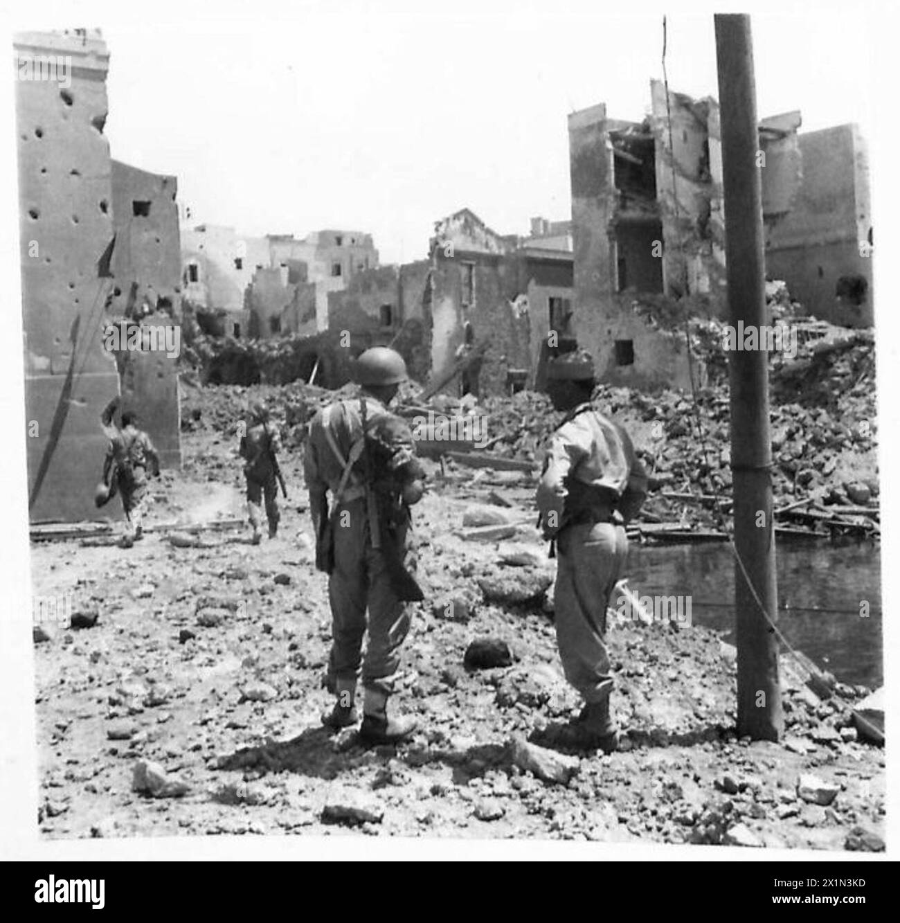 THE SURRENDER OF PANTELLARIA - Dockside scene showing the devastation ...