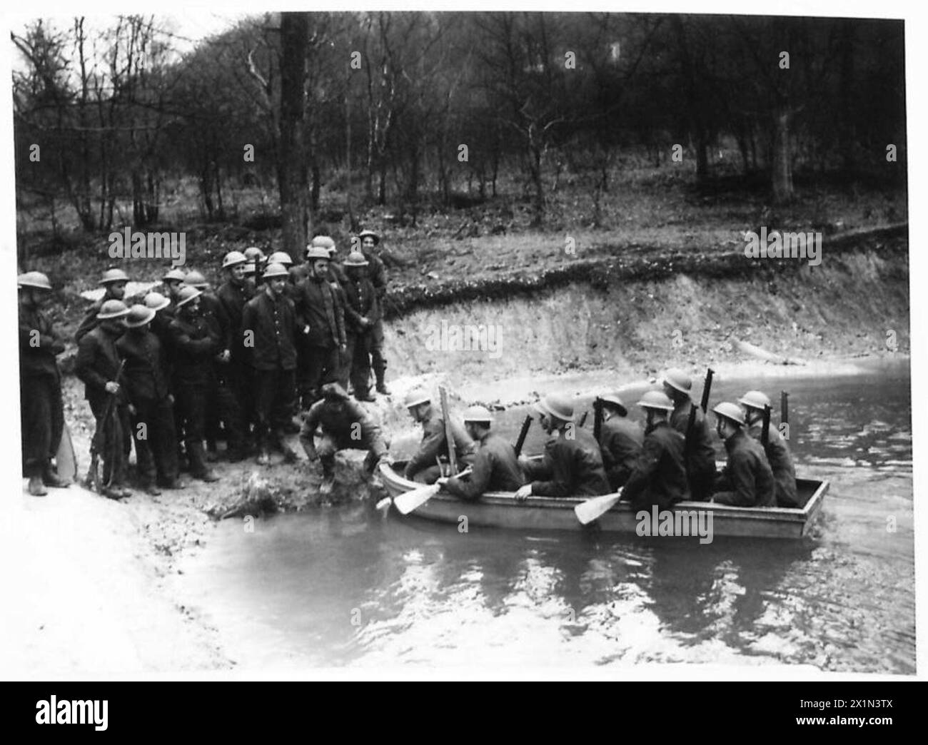 London Irish Rifles personnel are seen landing during training ...