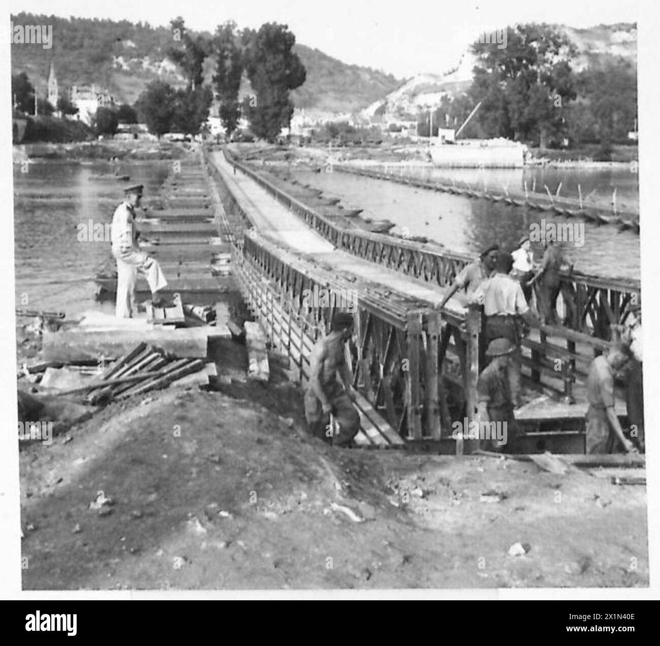 CROSSING THE SEINE BRIDGES - Brig. Davy watches the completion of the ...