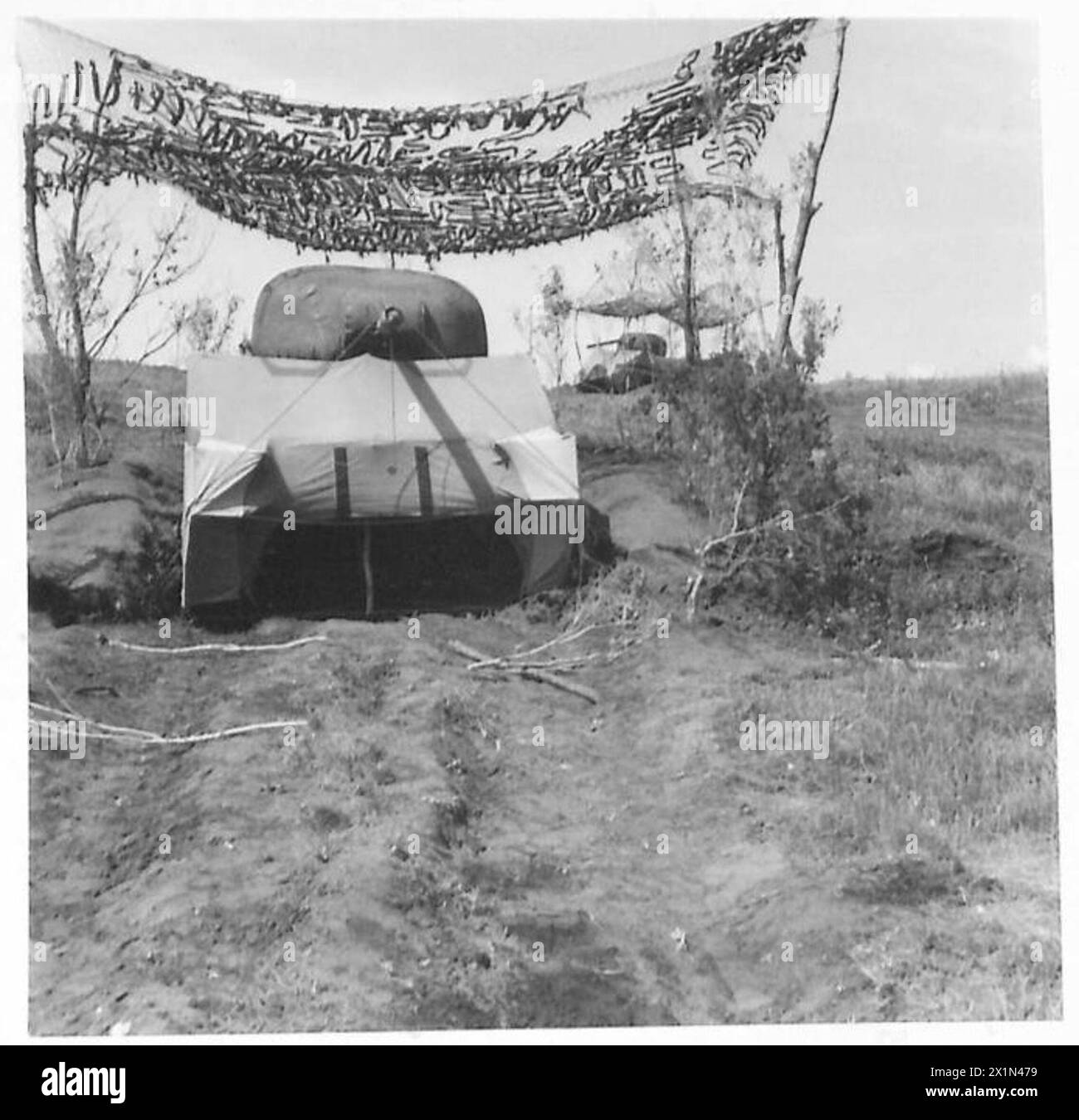 Dummy Sherman tanks are positioned in the wadis of Simpole Street near ...
